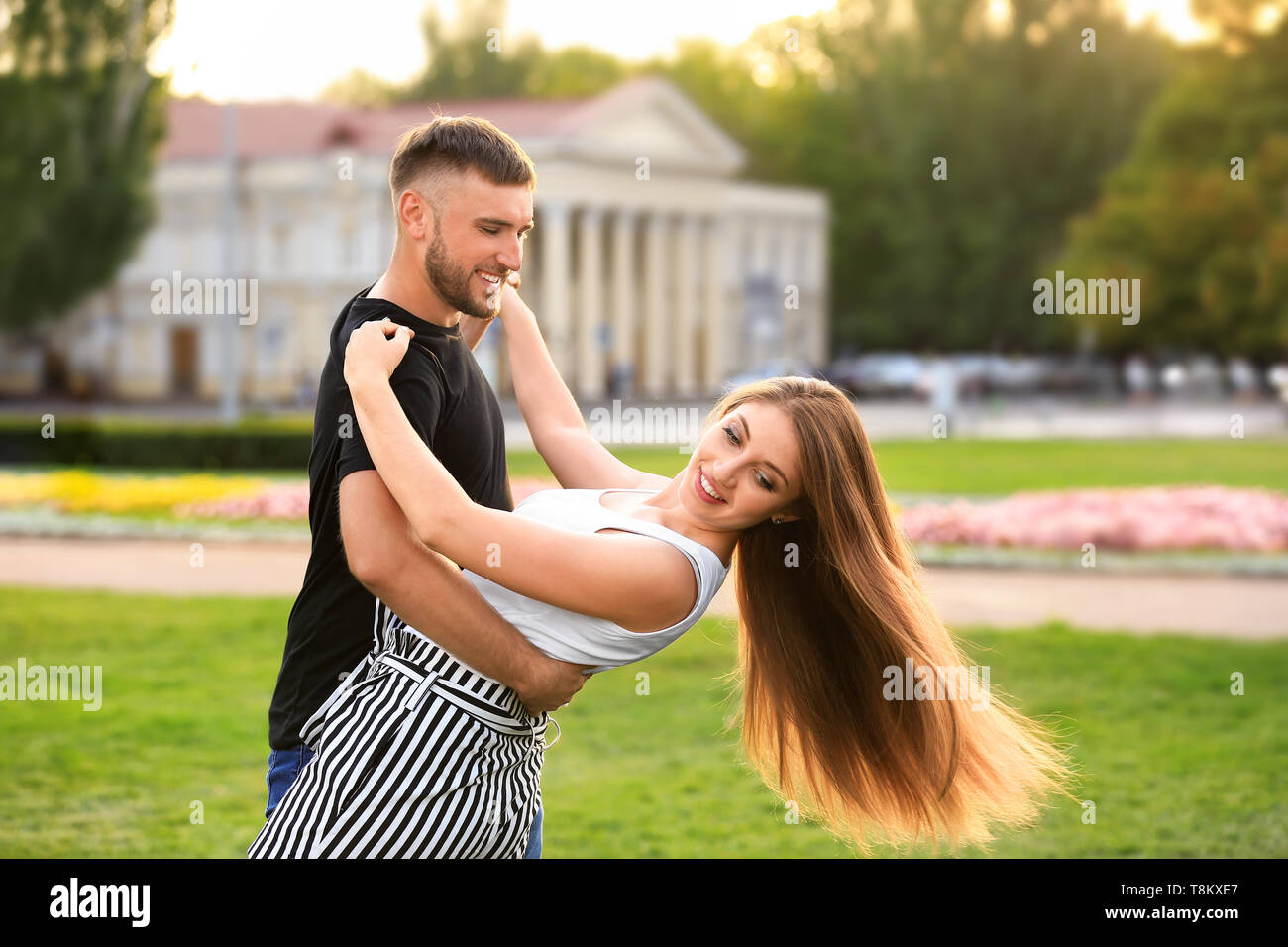 Young couple dancing outdoors hi-res stock photography and images - Alamy