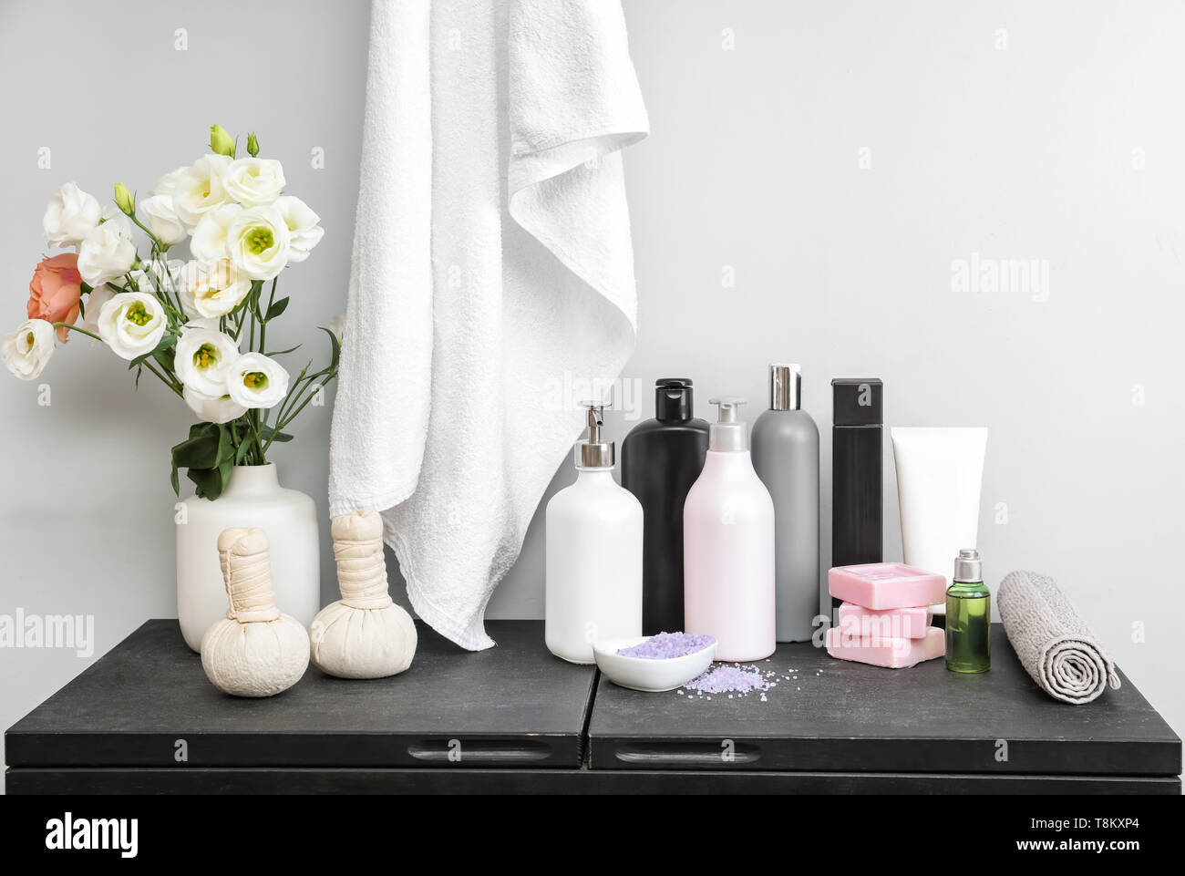 Set of bath cosmetics and accessories on dark table Stock Photo - Alamy