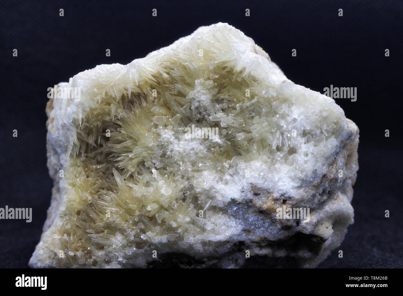 Calcite crystal macro close up and shining indoor with red background ...