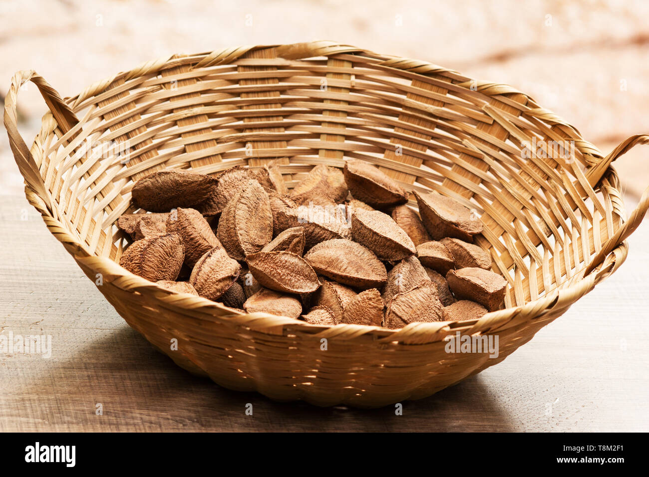 Brazil nuts in a basket Stock Photo - Alamy