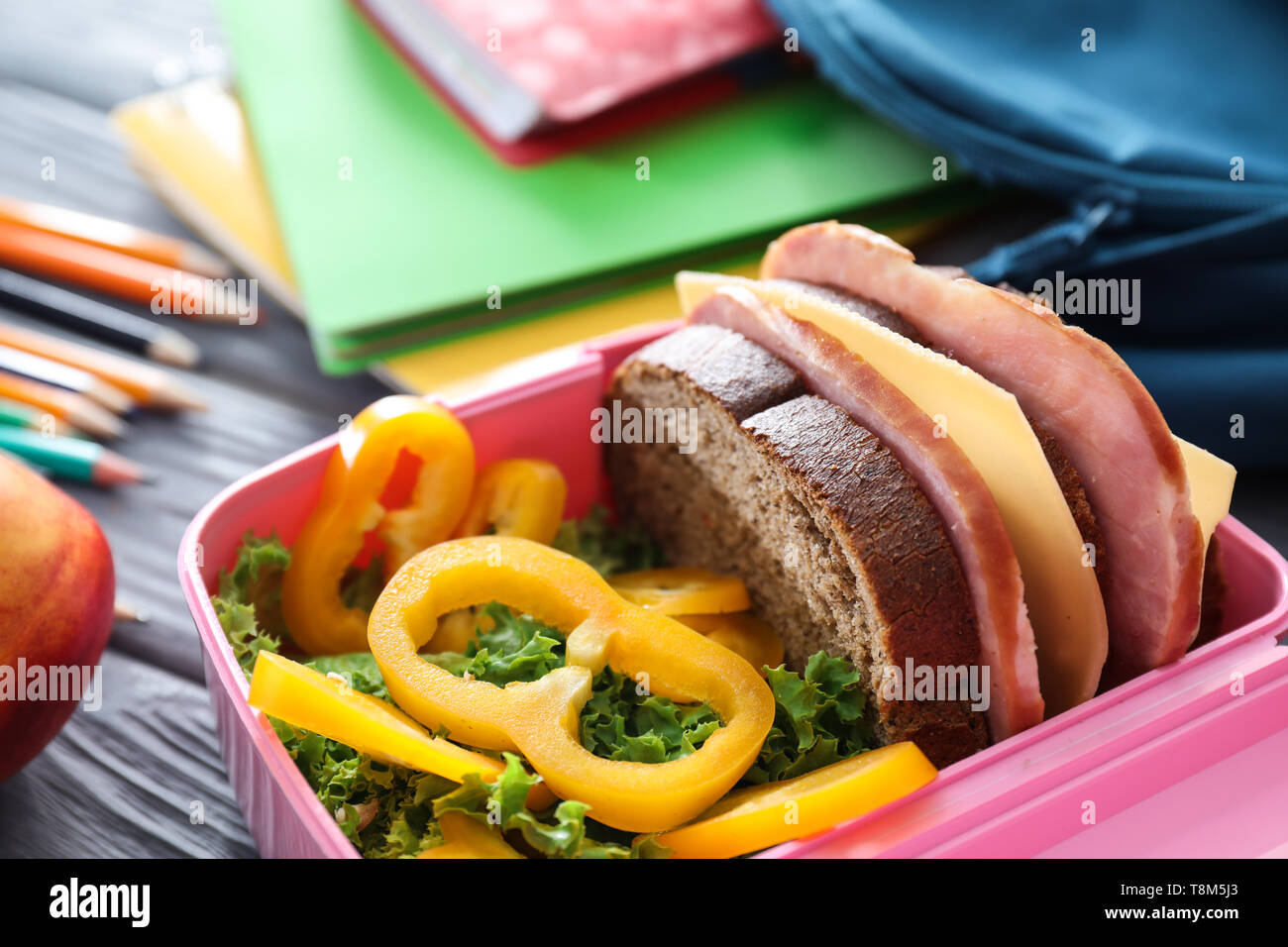 Appetizing food in lunch box on table Stock Photo - Alamy