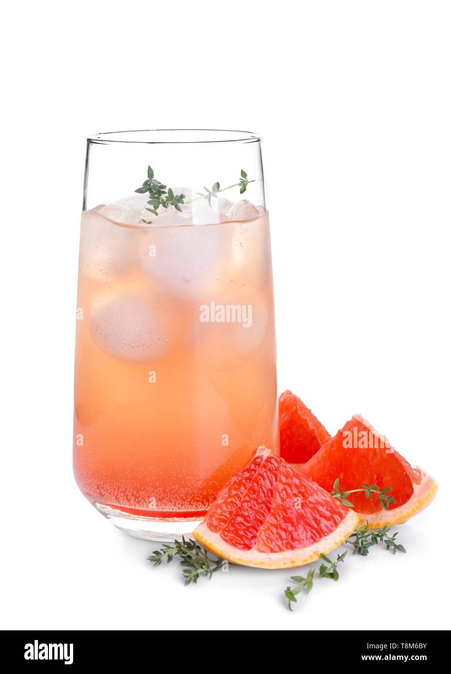 Glass of refreshing grapefruit lemonade on white background Stock Photo - Alamy