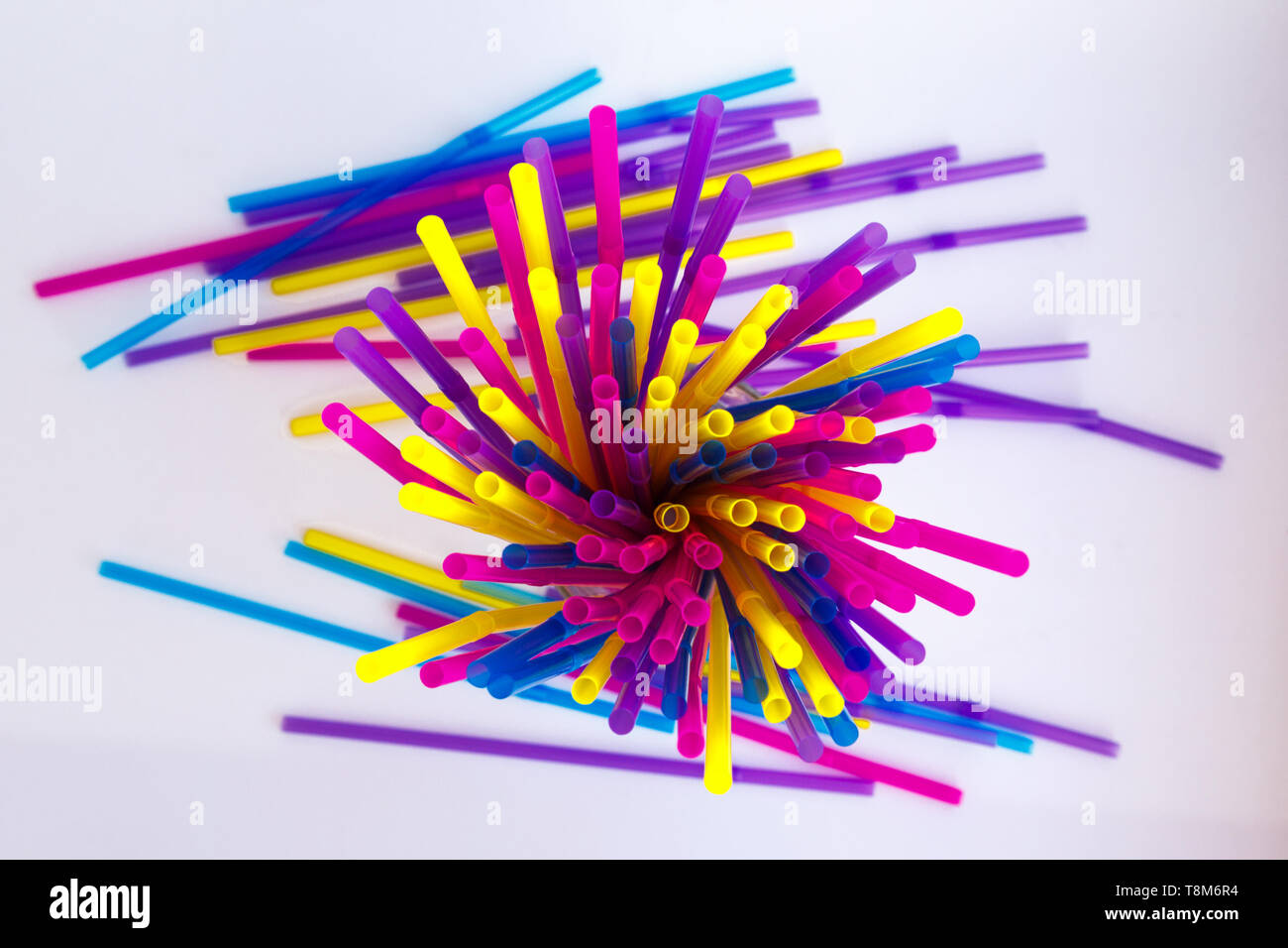 Set of colorful tubes for cocktails. Tubes are chaotic Stock Photo - Alamy