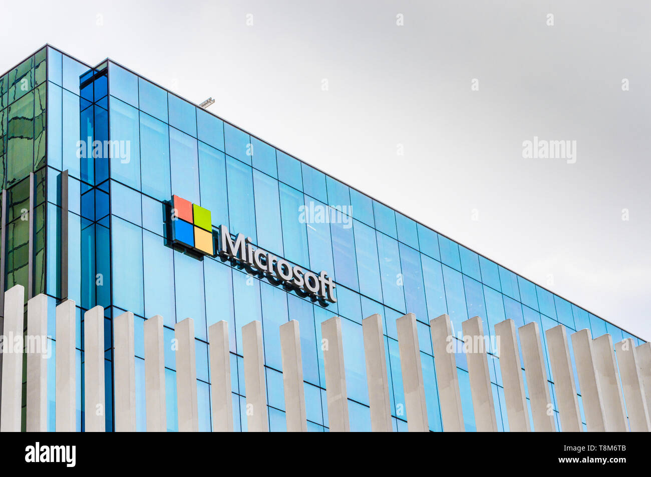 Exterior view of Microsoft Corporation logo on glass windowed West side ...