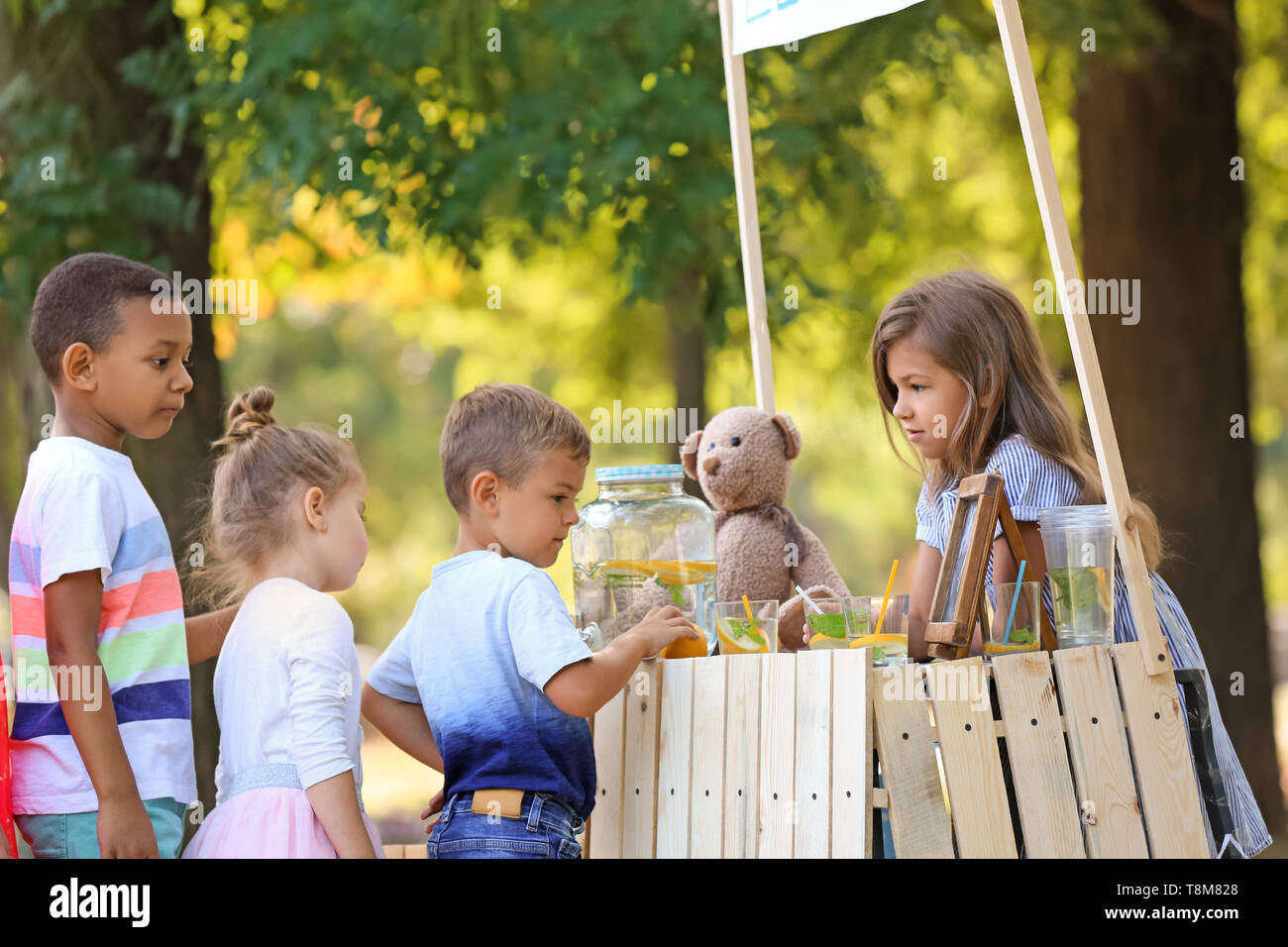 Children stand queue hi-res stock photography and images - Alamy