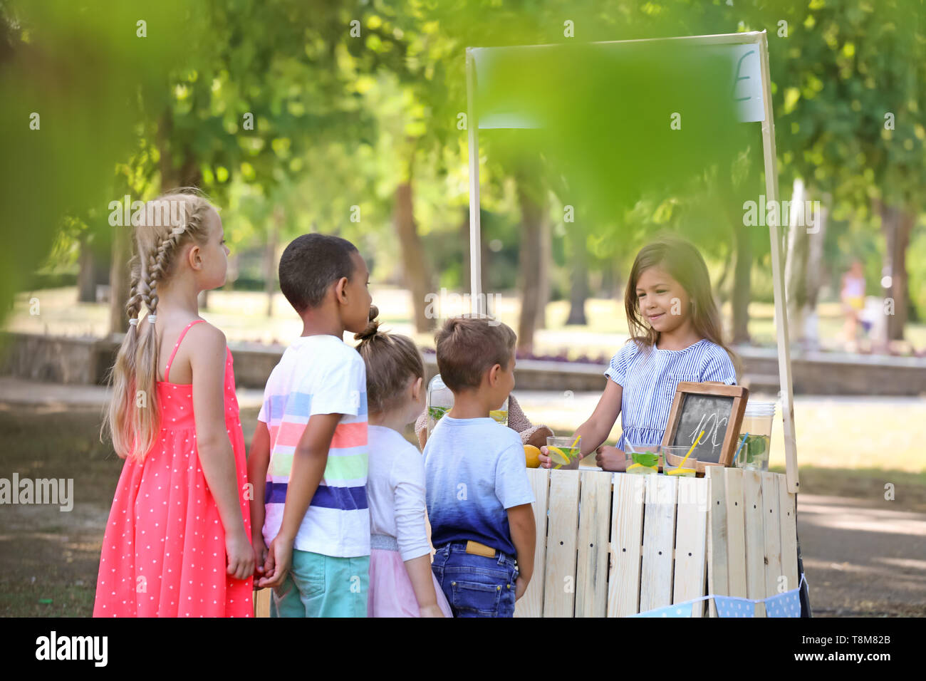 Children stand queue hi-res stock photography and images - Alamy