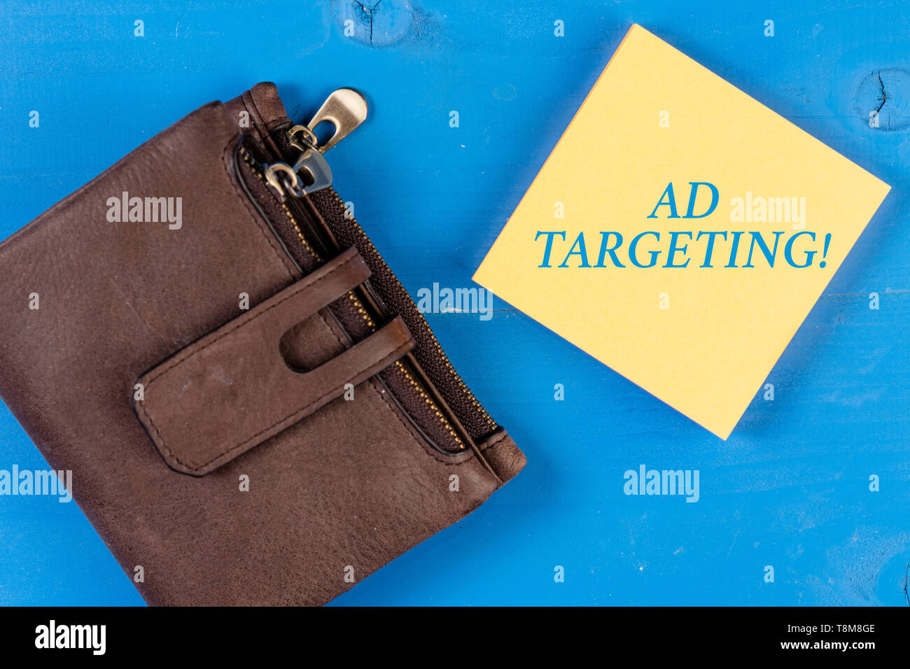 Writing note showing Ad Targeting. Business concept for target the most ...