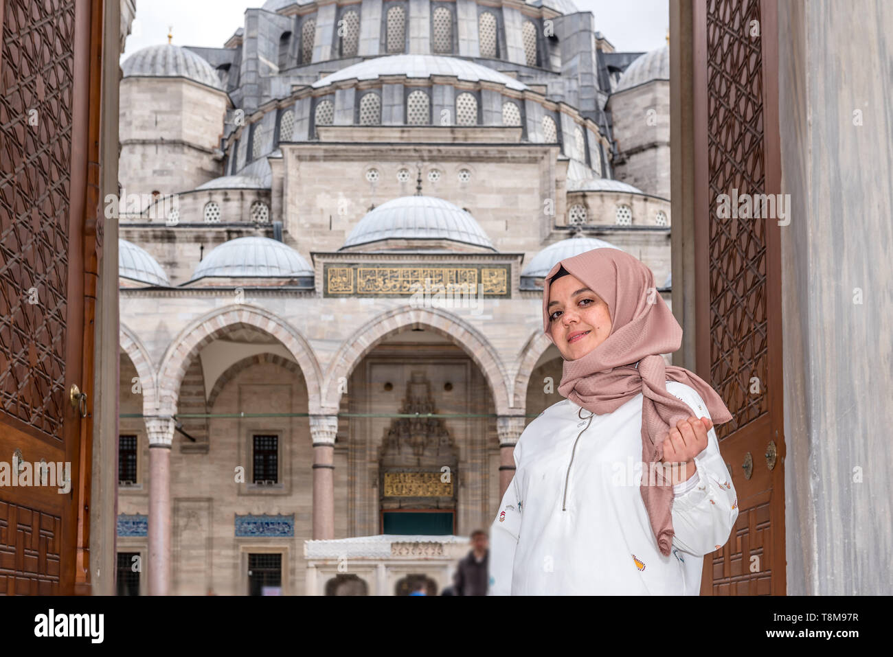 Beautiful Muslim woman in headscarf and fashionable modern trendy ...