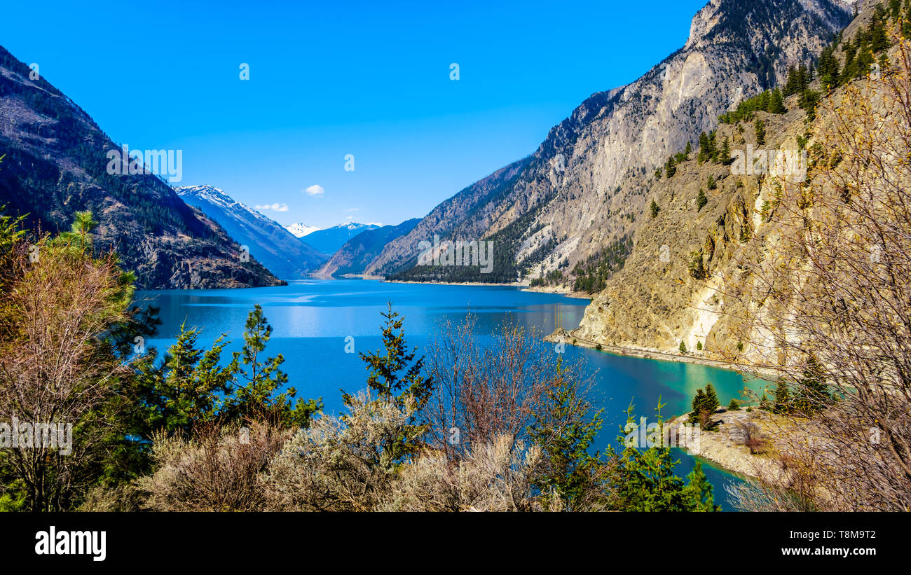 Green waters of Seton Lake on the foot of Mount McLean near Lillooet ...