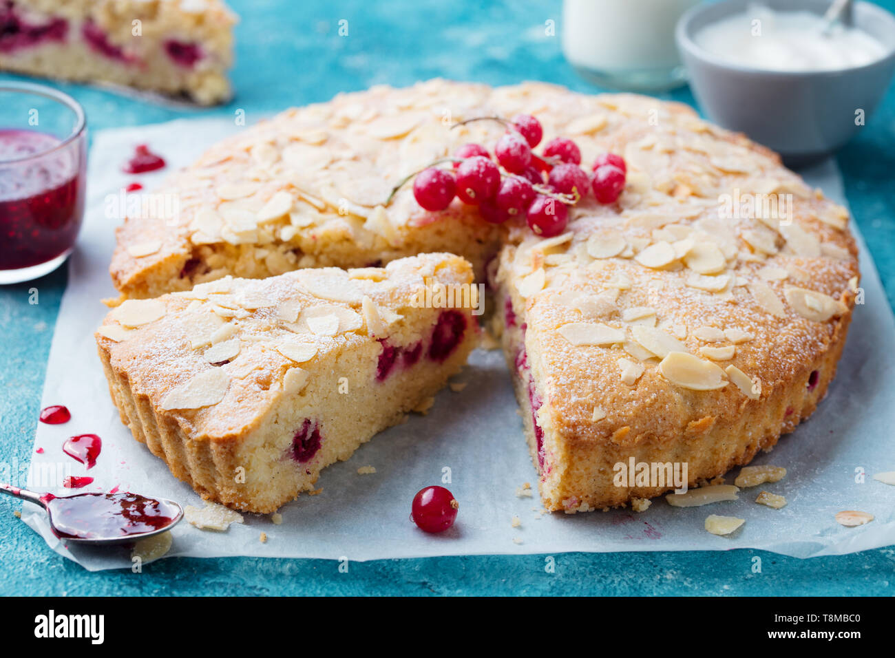 Almond and berry cake, Bakewell tart. Traditional British pastry. Blue ...