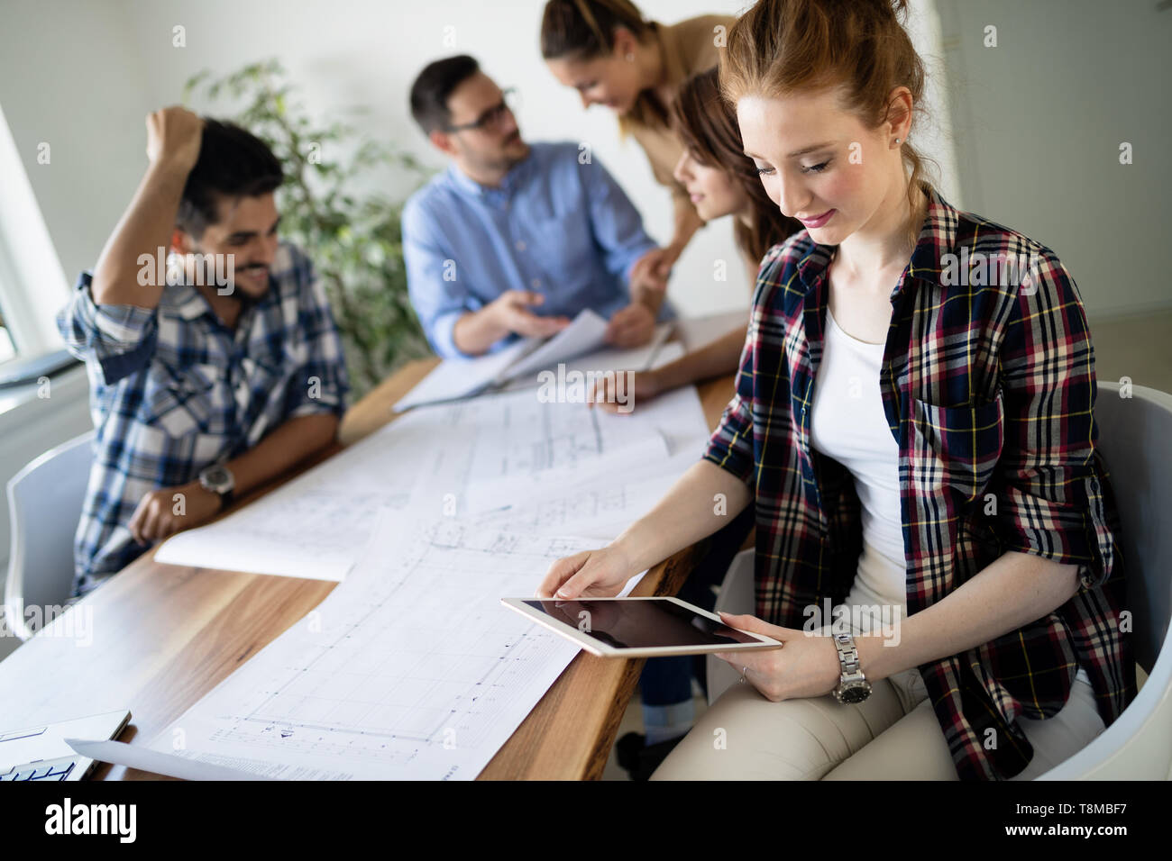 Company coworkers discussing ideas and brainstorming Stock Photo - Alamy