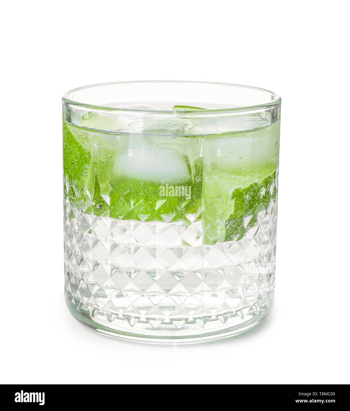 Glass of fresh lime lemonade on white background Stock Photo - Alamy