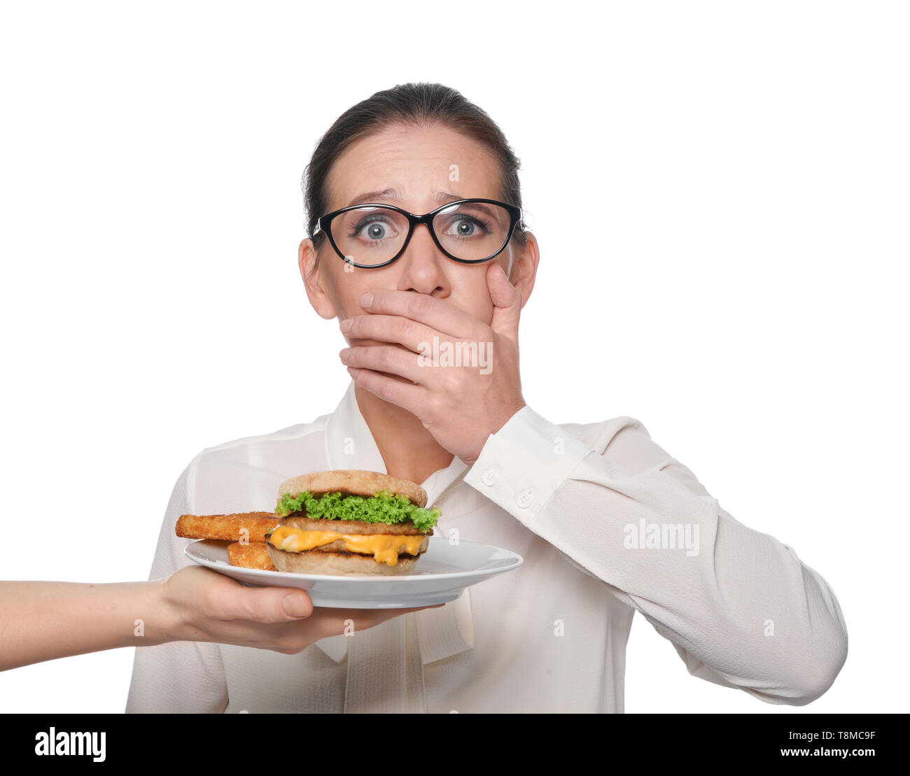 Woman refusing to eat unhealthy food on white background. Diet concept ...