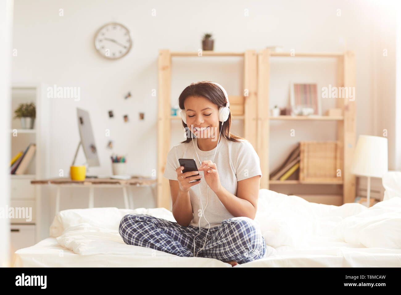 Contemporary Young Woman Using Gadgets Stock Photo - Alamy