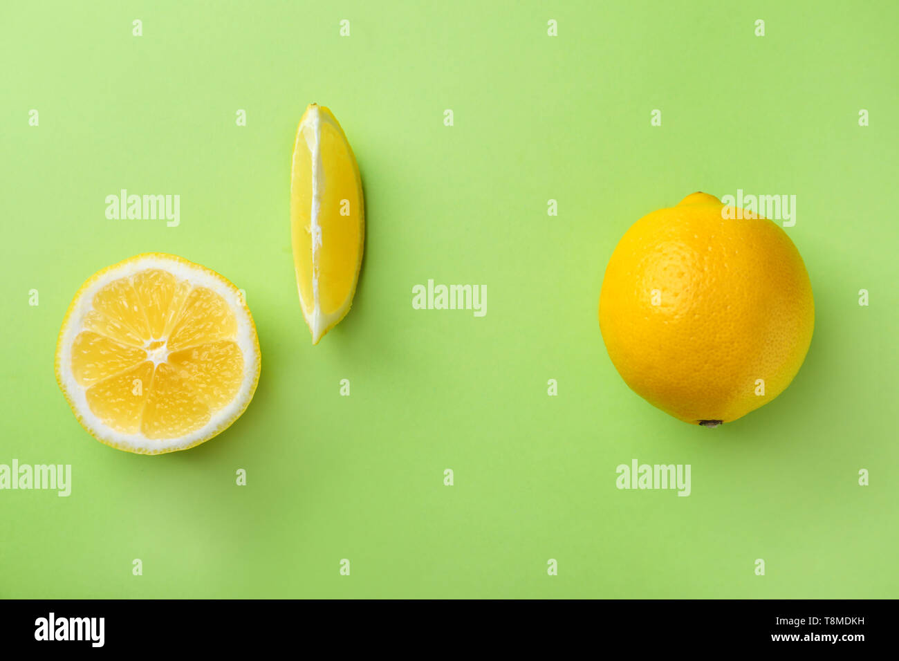 Ripe lemons on color background Stock Photo - Alamy
