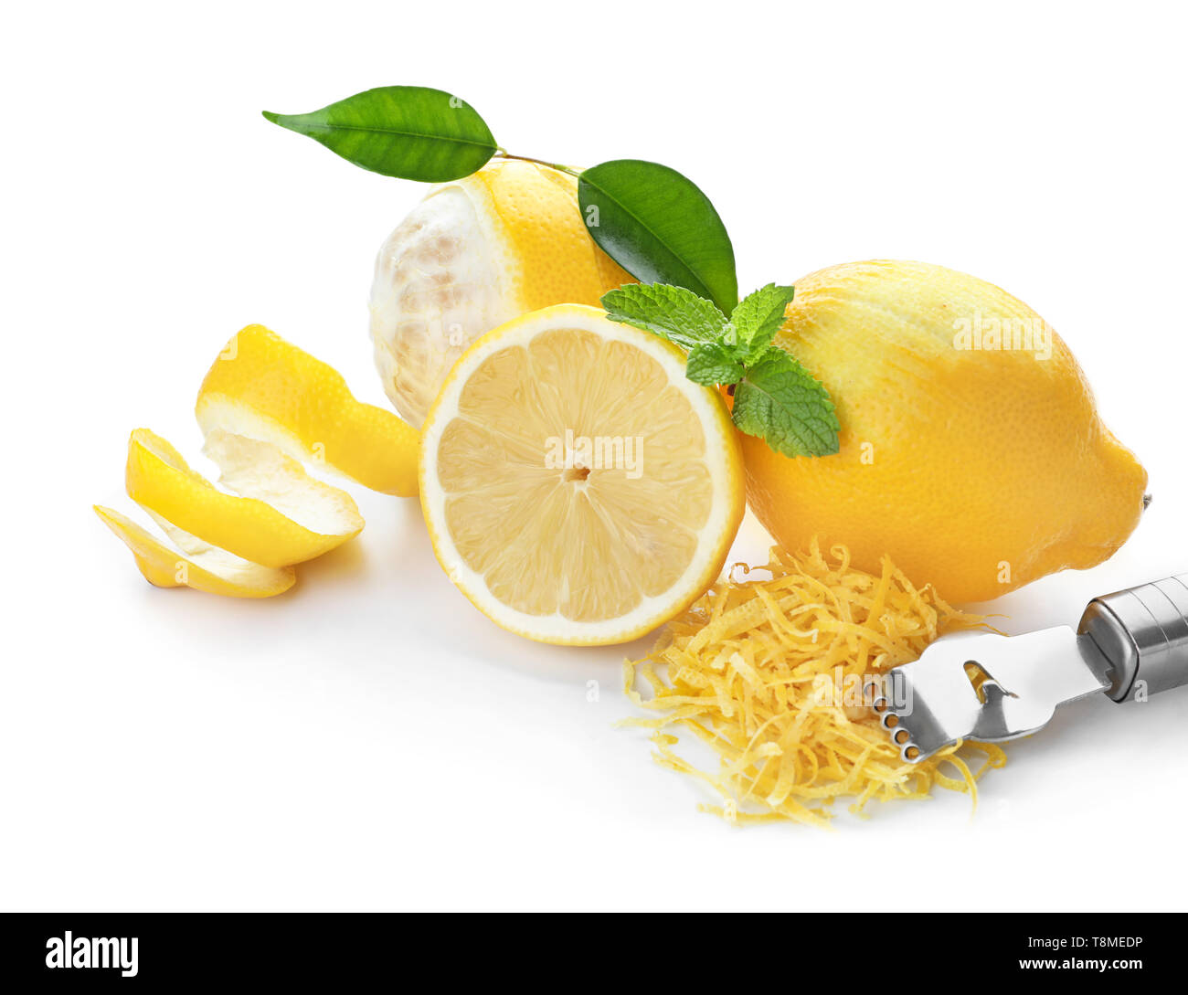 Ripe lemons with zest on white background Stock Photo - Alamy