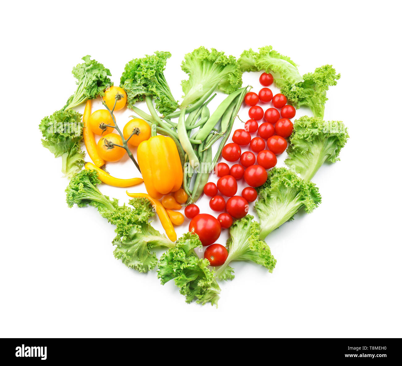 Heart made of various fresh vegetables on white background Stock Photo ...