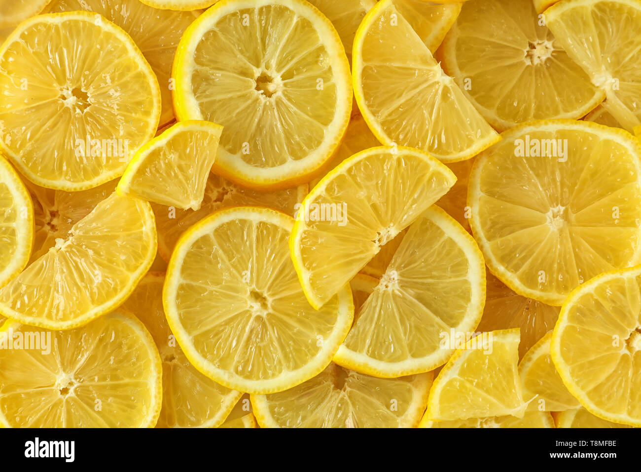 Many fresh lemon slices Stock Photo - Alamy
