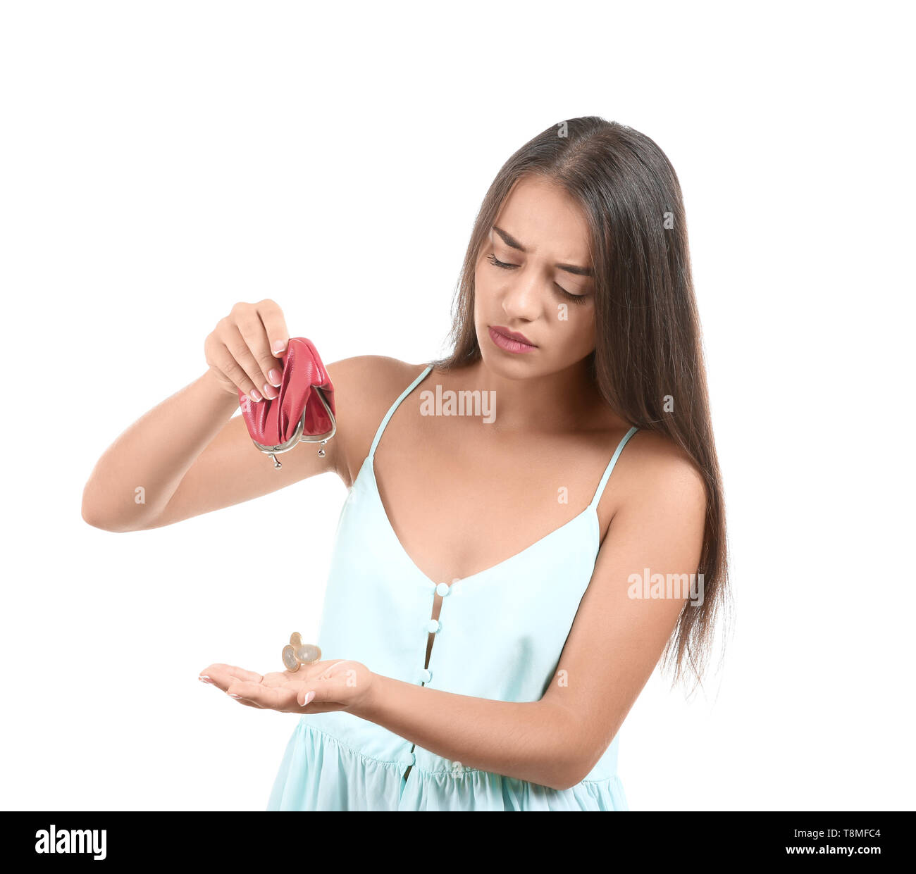 Sad young woman with empty wallet on white background Stock Photo - Alamy