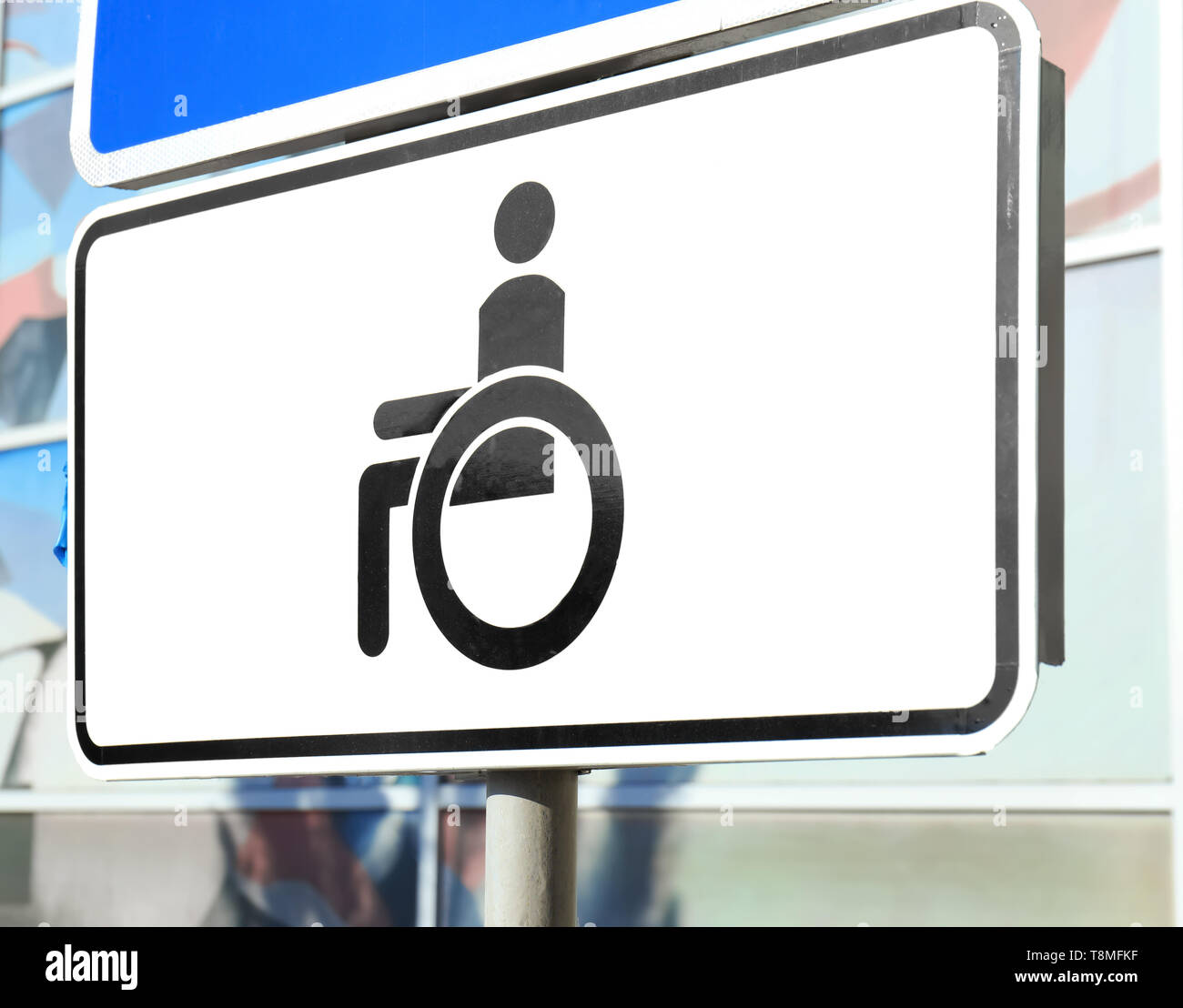 Sign of people with a mobility impairment on parking place Stock Photo ...