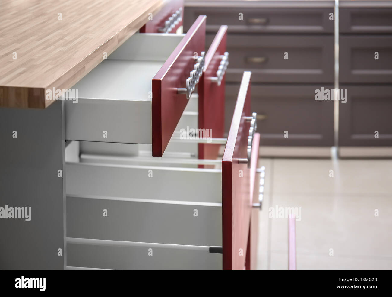 Open empty kitchen drawers Stock Photo - Alamy