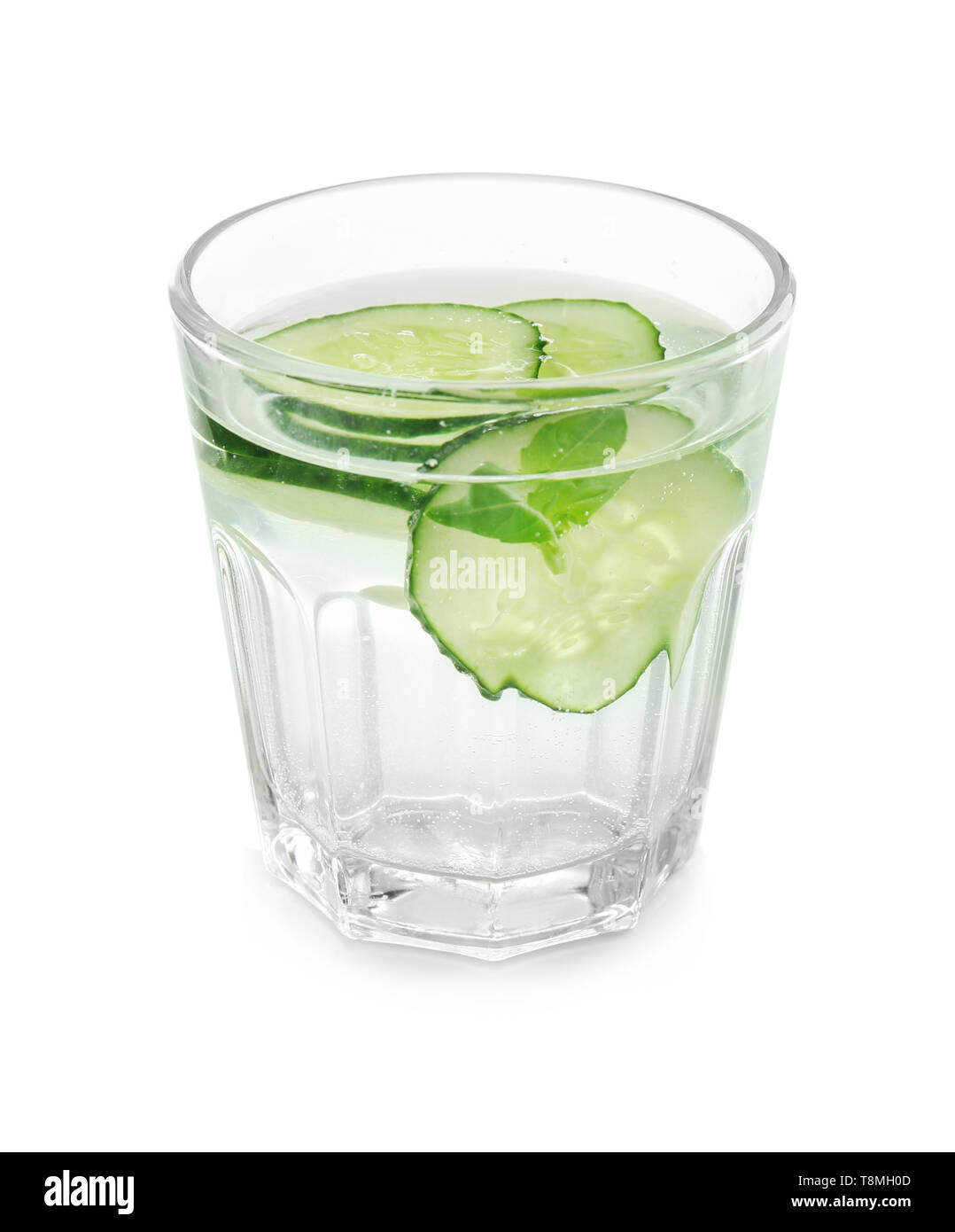 Glass of fresh cucumber water on white background Stock Photo - Alamy