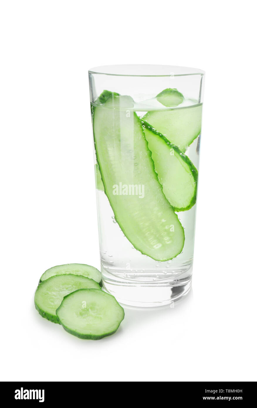 Glass of fresh cucumber water on white background Stock Photo - Alamy