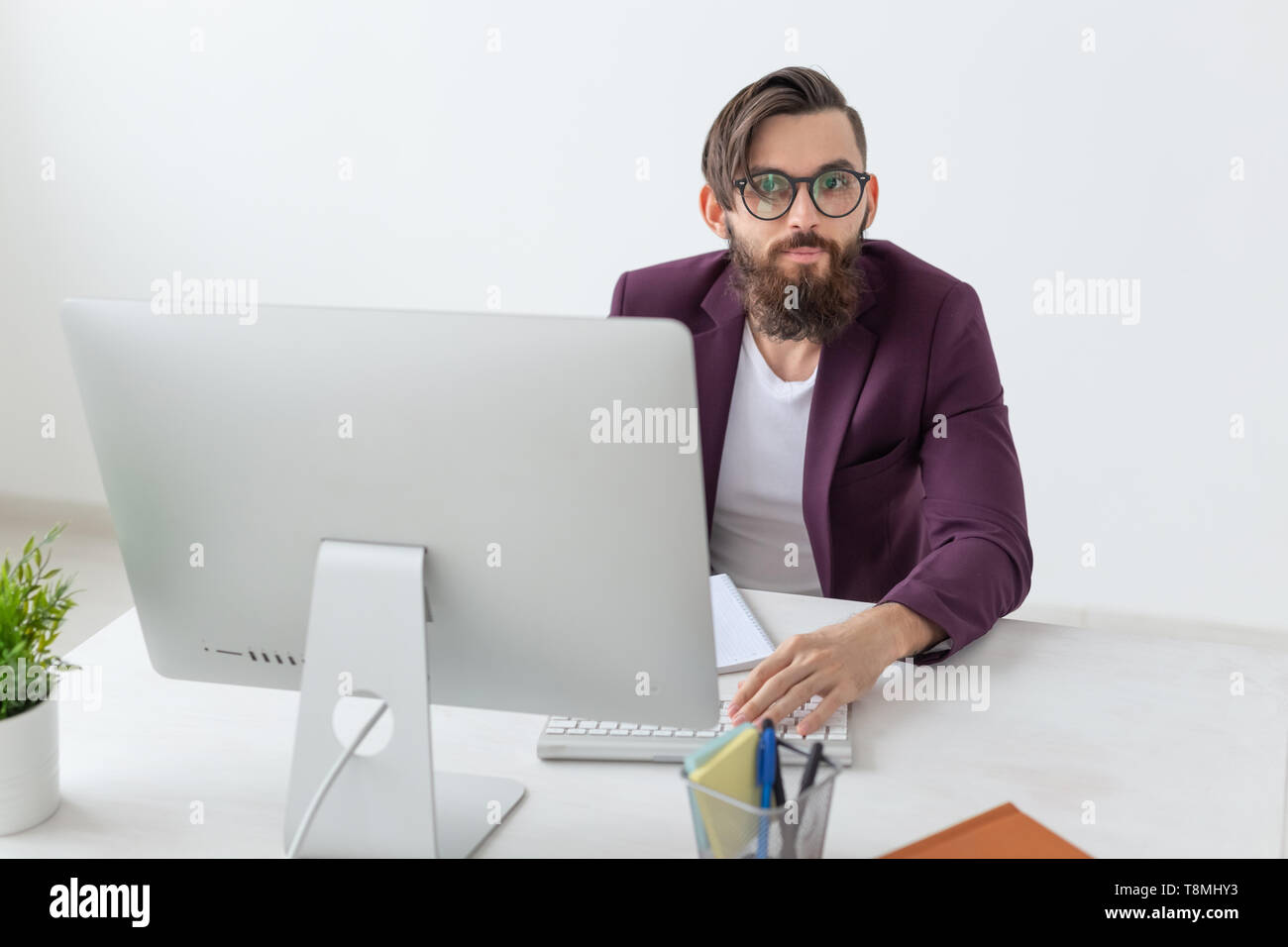 people, design and style concept - graphic designer sketching new ...