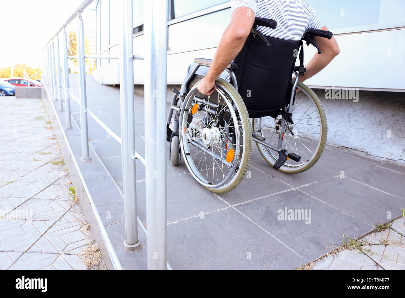 Young man wheelchair ramp hi-res stock photography and images - Alamy