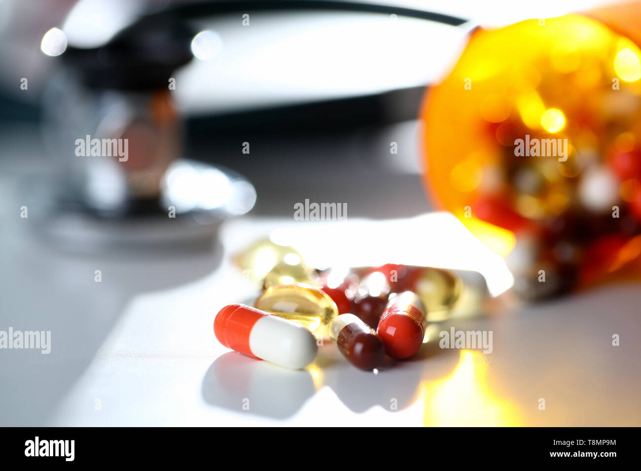 Tablets scattered on the table of the Stock Photo - Alamy