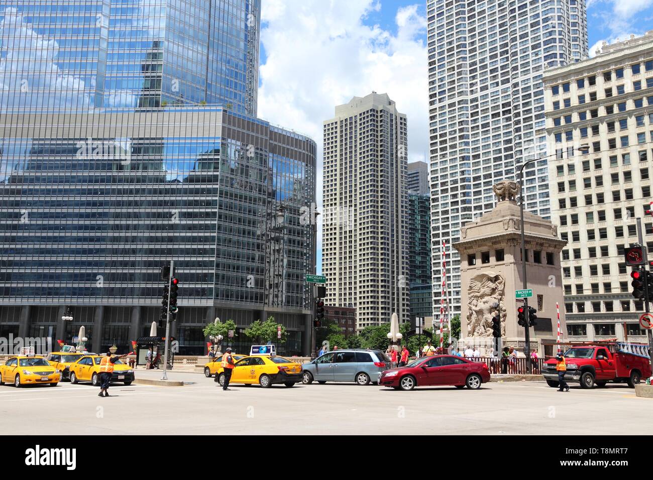 CHICAGO, USA - JUNE 28, 2013: People ride taxi cabs in downtown Chicago ...