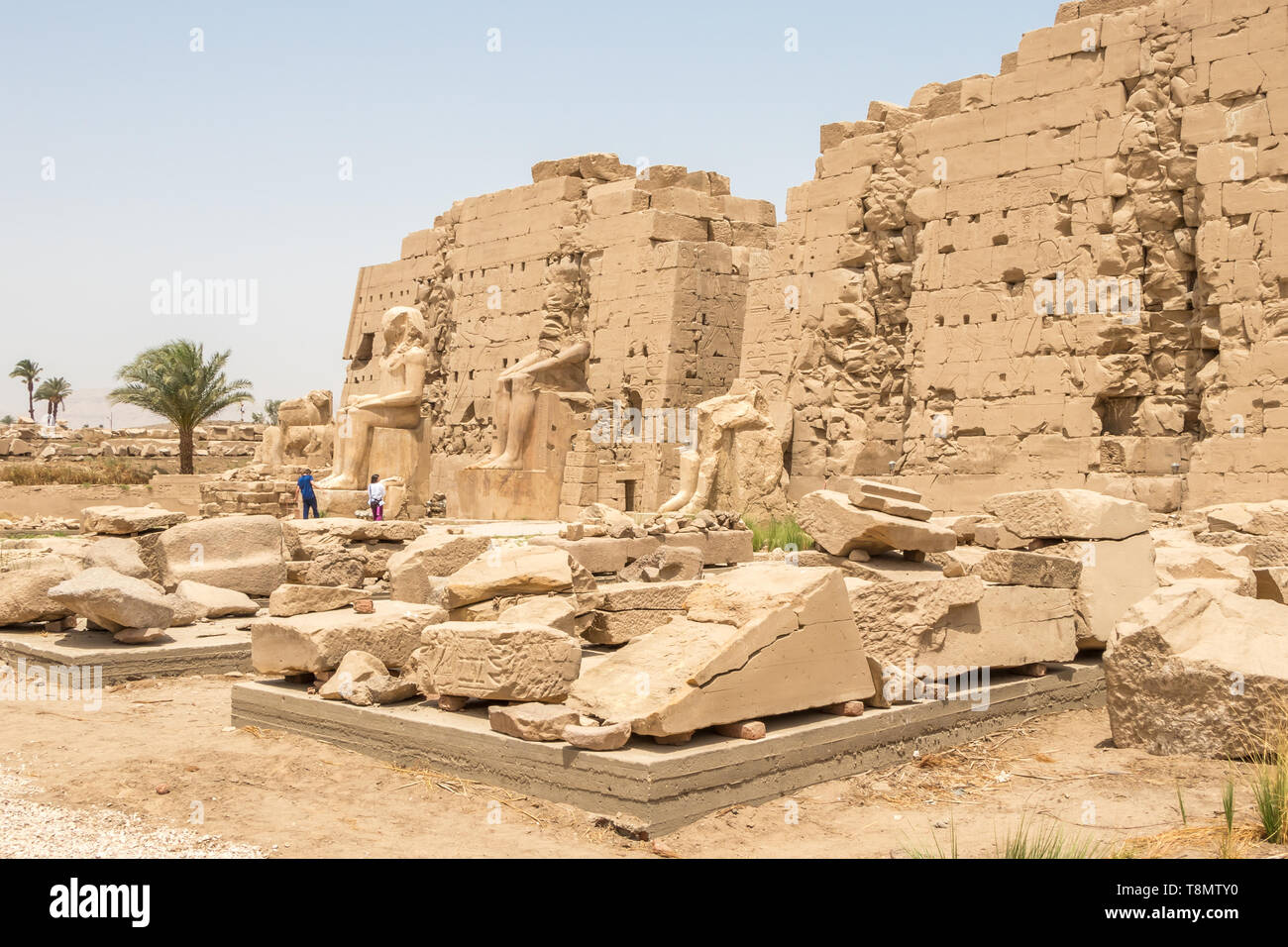 Statues in front of the Egyptian temple in Karnak Stock Photo - Alamy