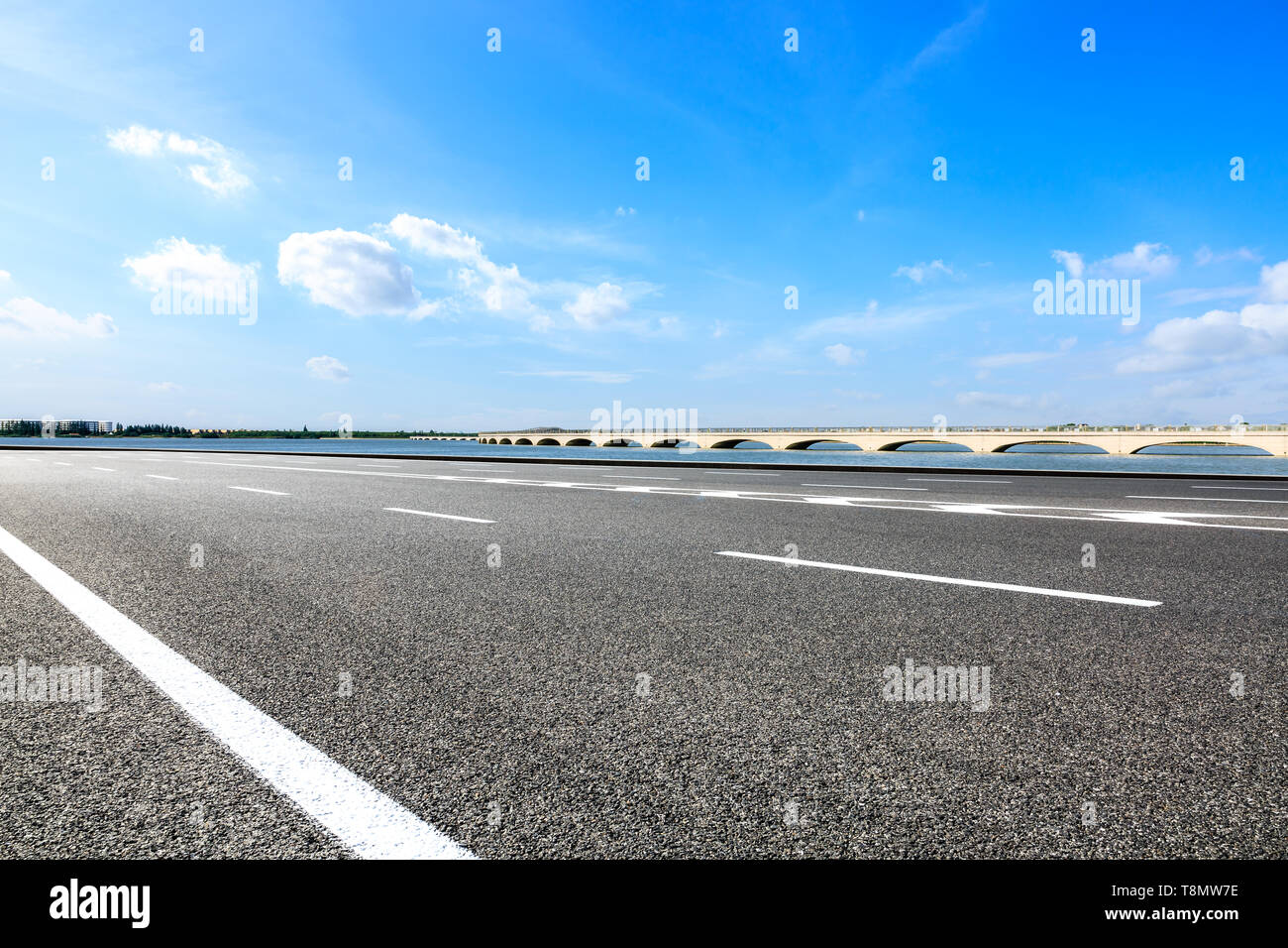Empty street under bridge hi-res stock photography and images - Alamy