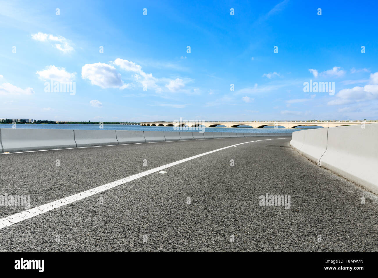 Empty street under bridge hi-res stock photography and images - Alamy