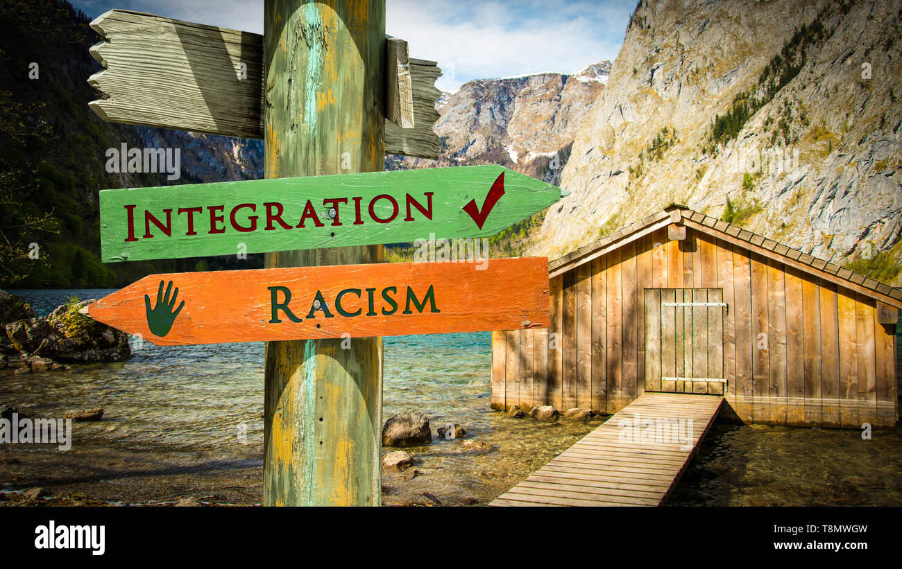 Street Sign the Direction Way to Integration versus Racism Stock Photo ...