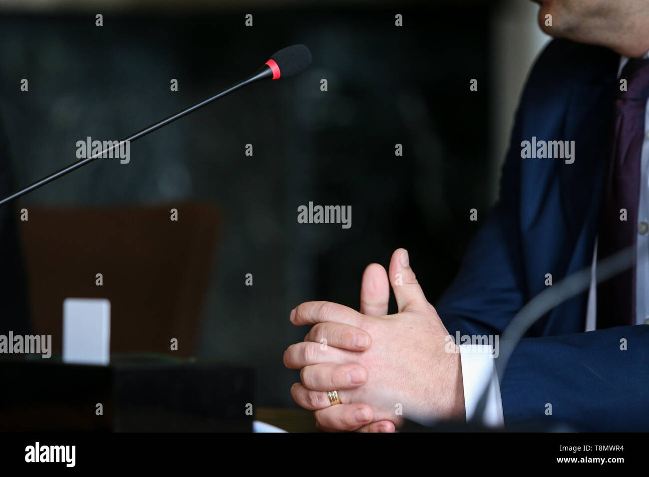 Details with the hands of a man in a suit (businessman, CEO, politician ...