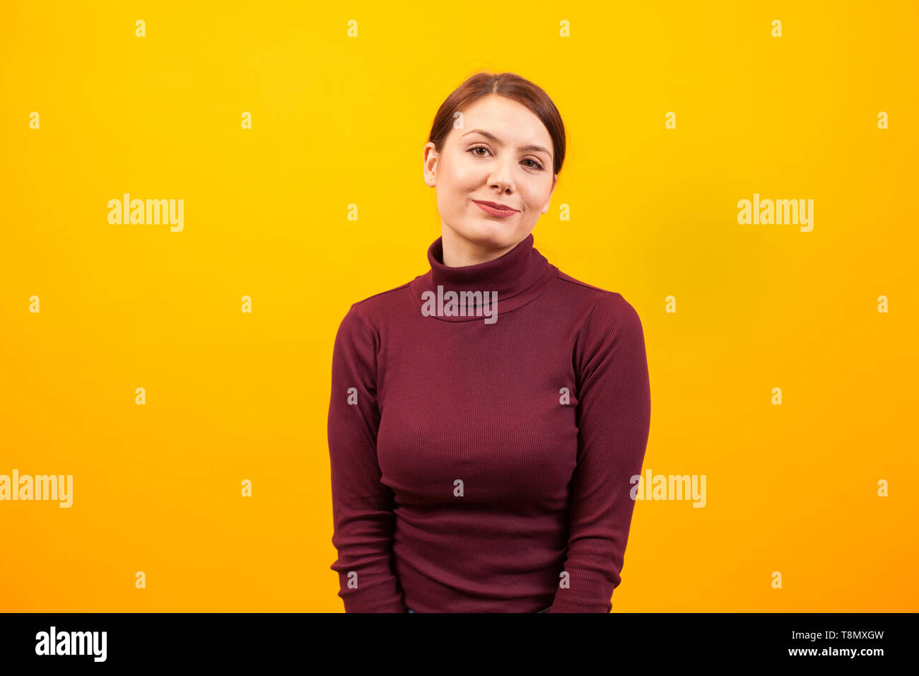 Charming caucasian woman in casual clothes over yellow background ...