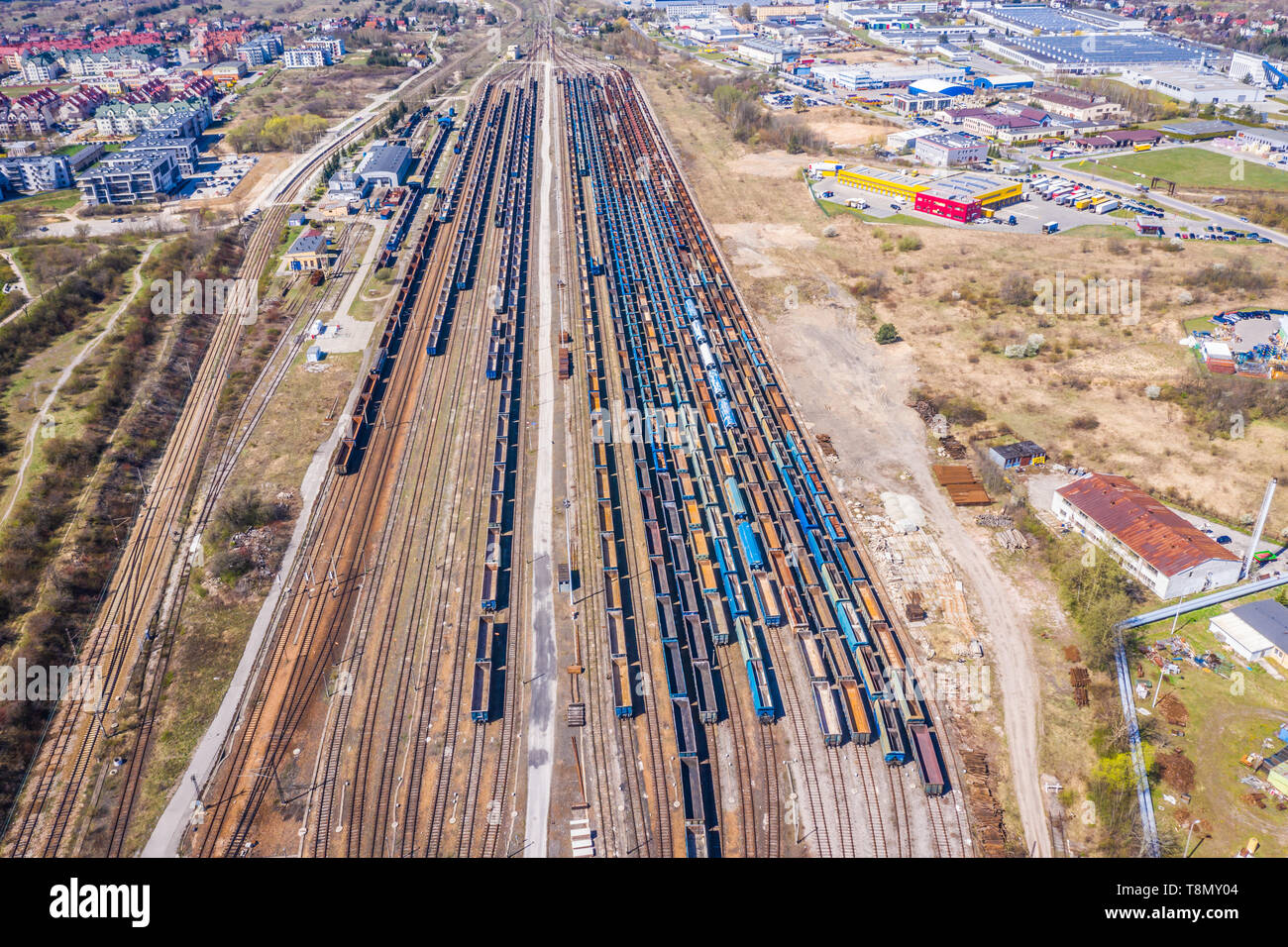 Cargo trains. Aerial view of colorful freight trains on the railway ...