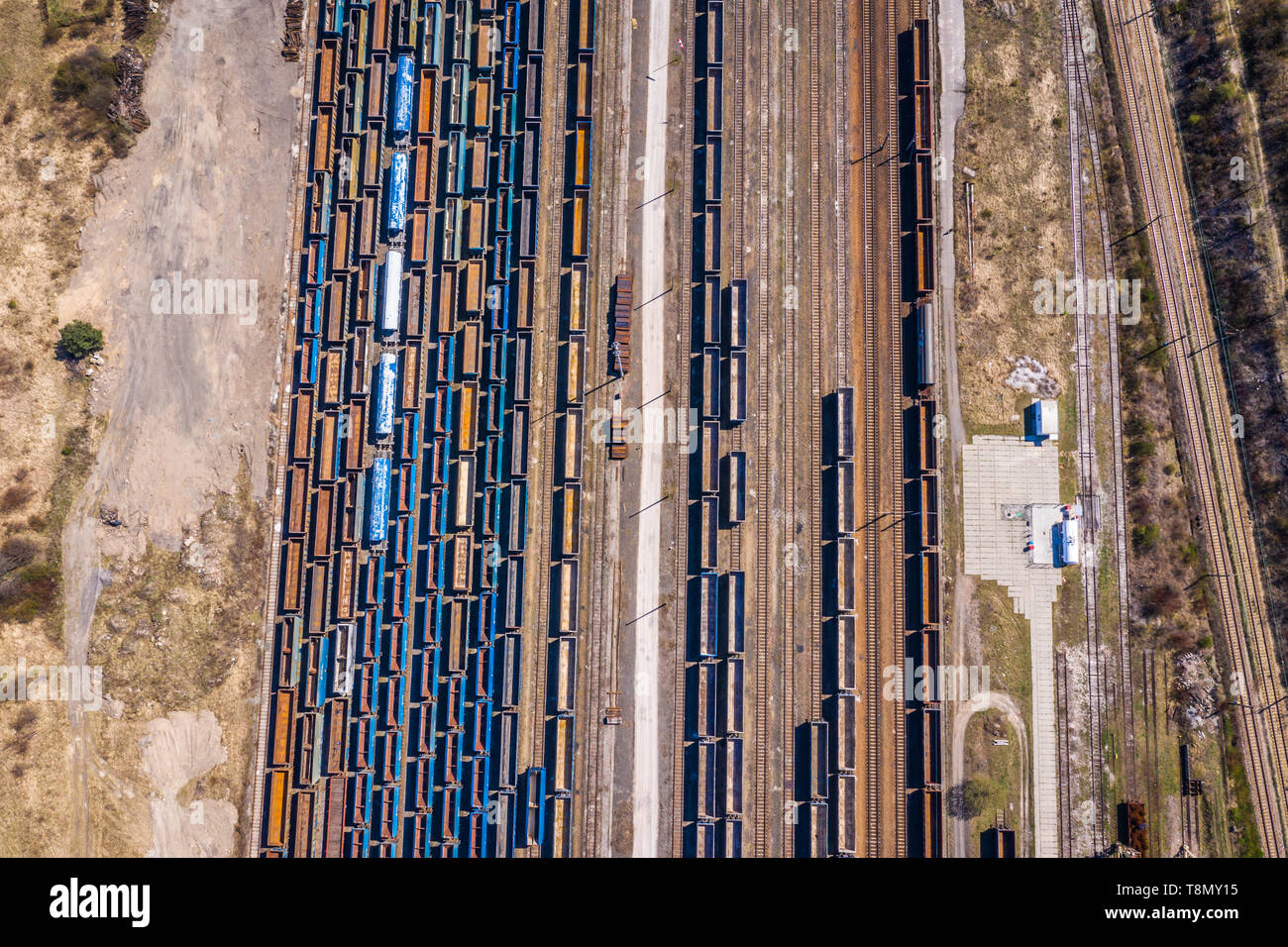 Cargo trains. Aerial view of colorful freight trains on the railway ...