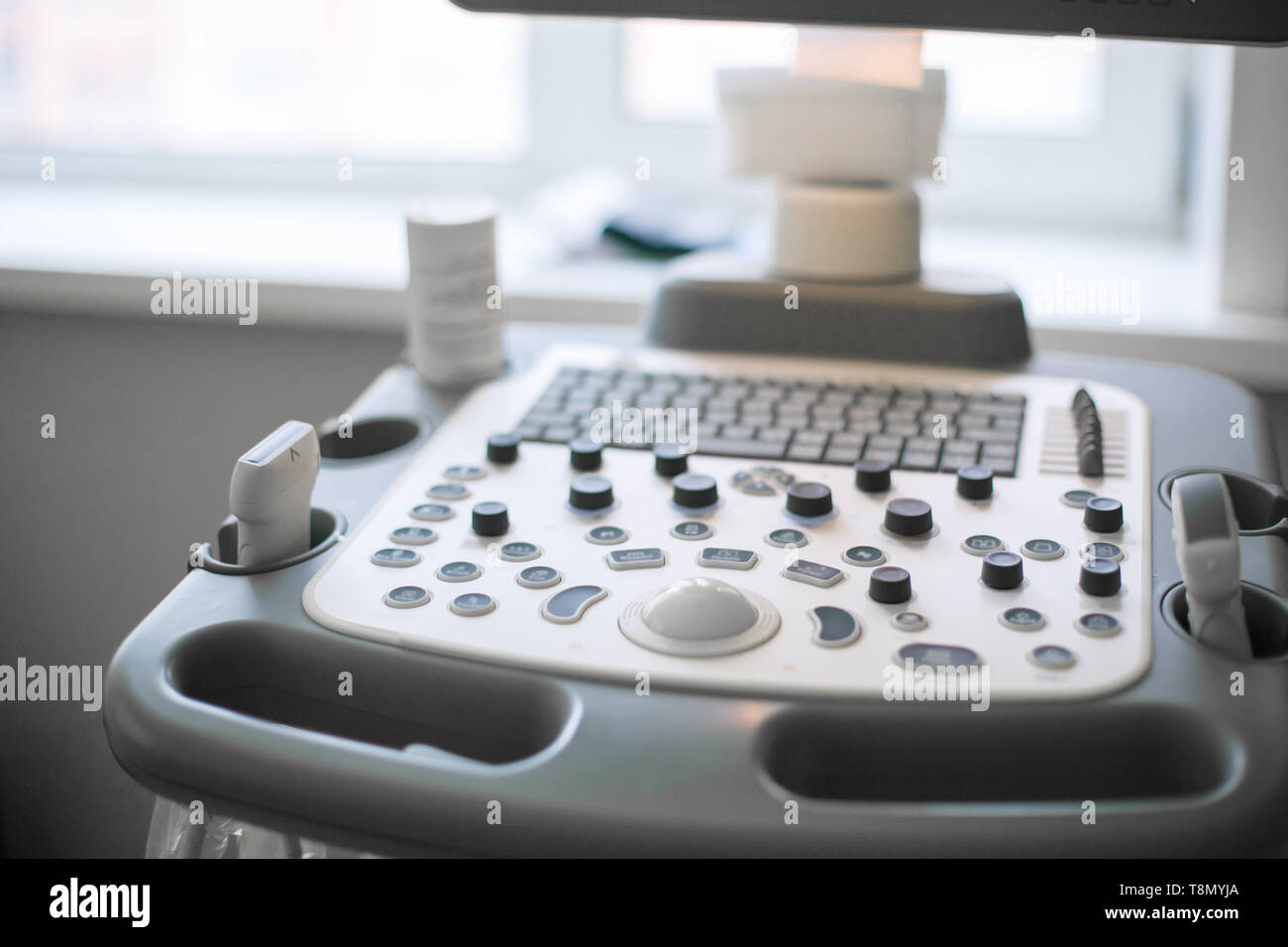 Close up in backlit high-tech ultrasound machine. Analysis, diagnosis ...