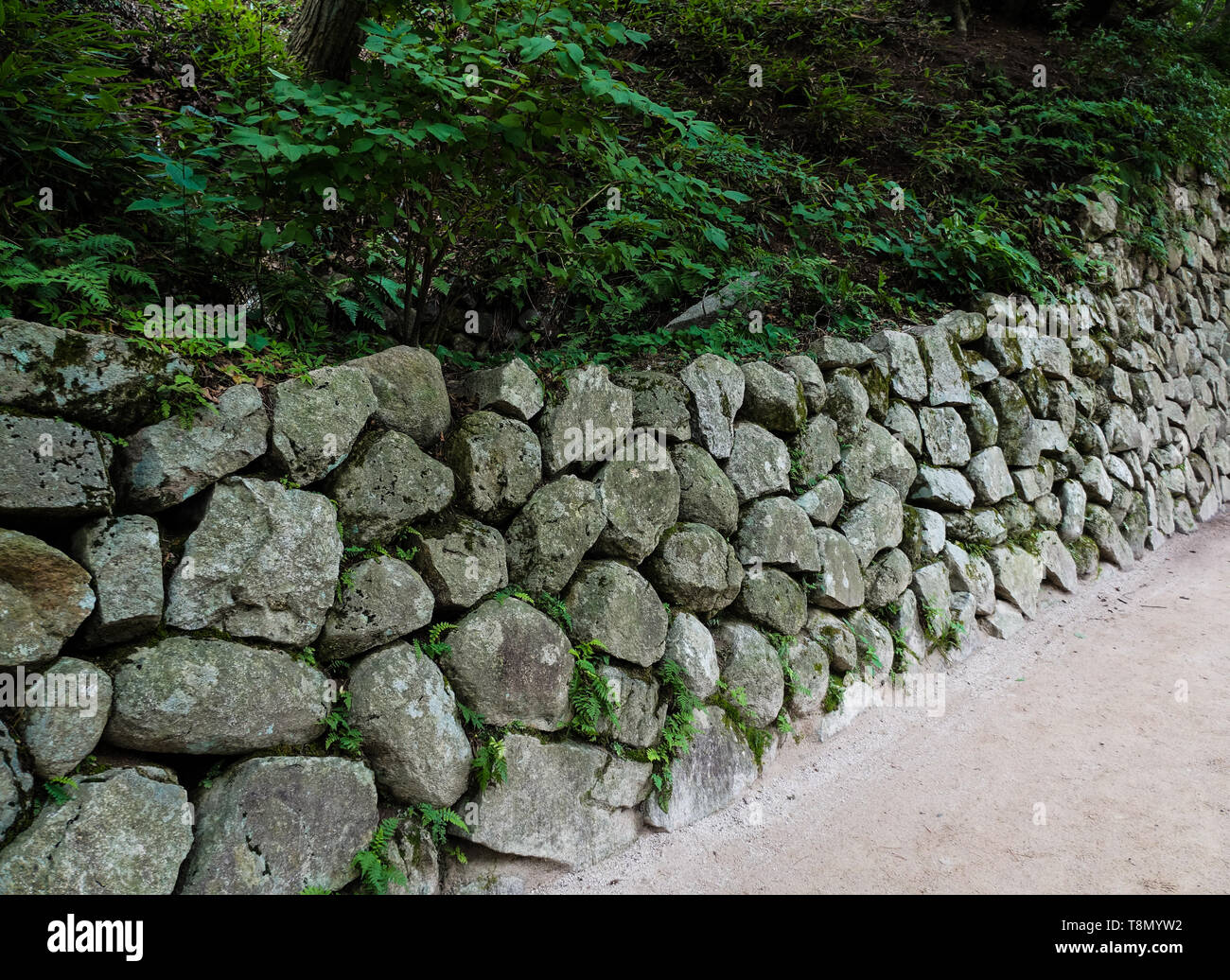 Old stone wall road Korean countryside Stock Photo - Alamy