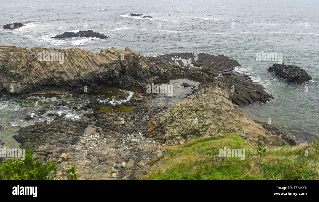 Columnar joint in the sea Stock Photo - Alamy