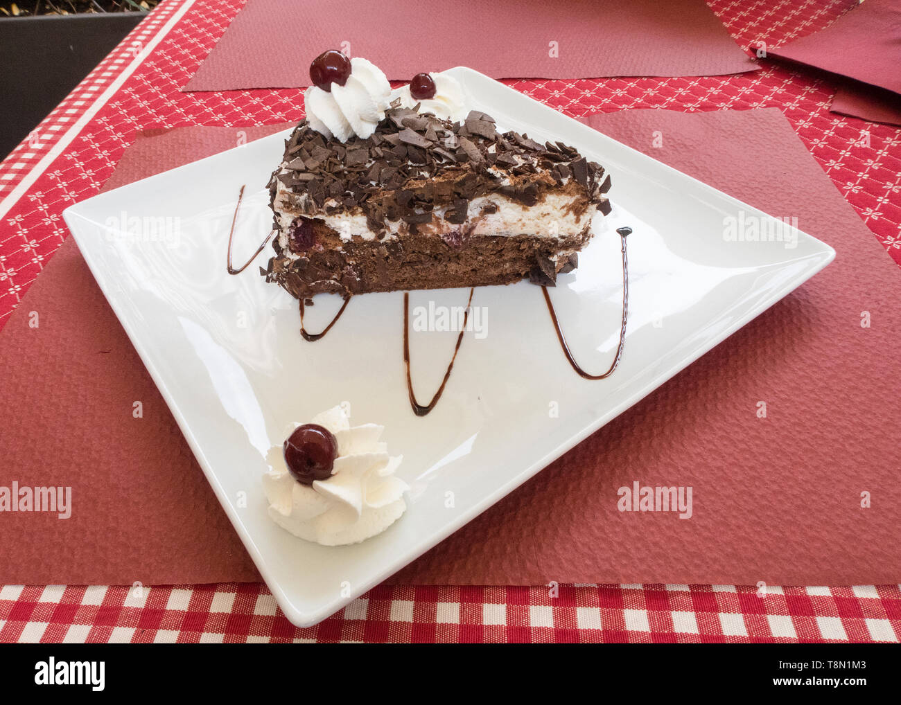 White forest cake slice hi-res stock photography and images - Alamy