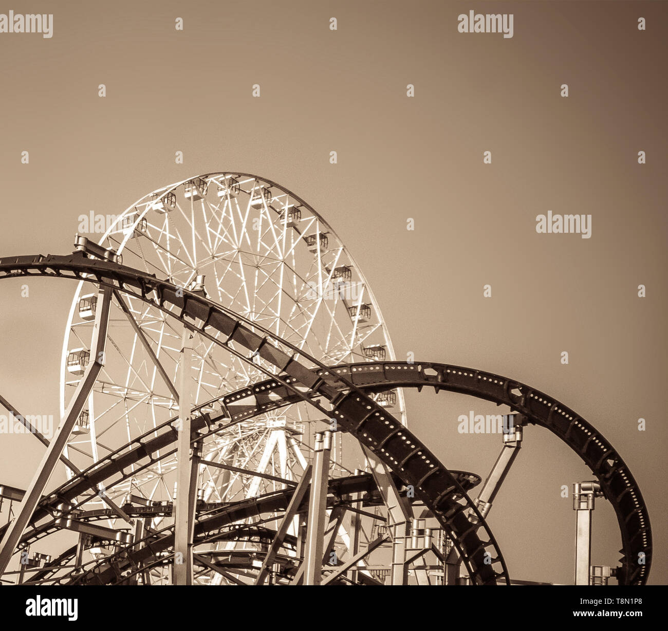 roller coaster and ferris wheel Stock Photo - Alamy