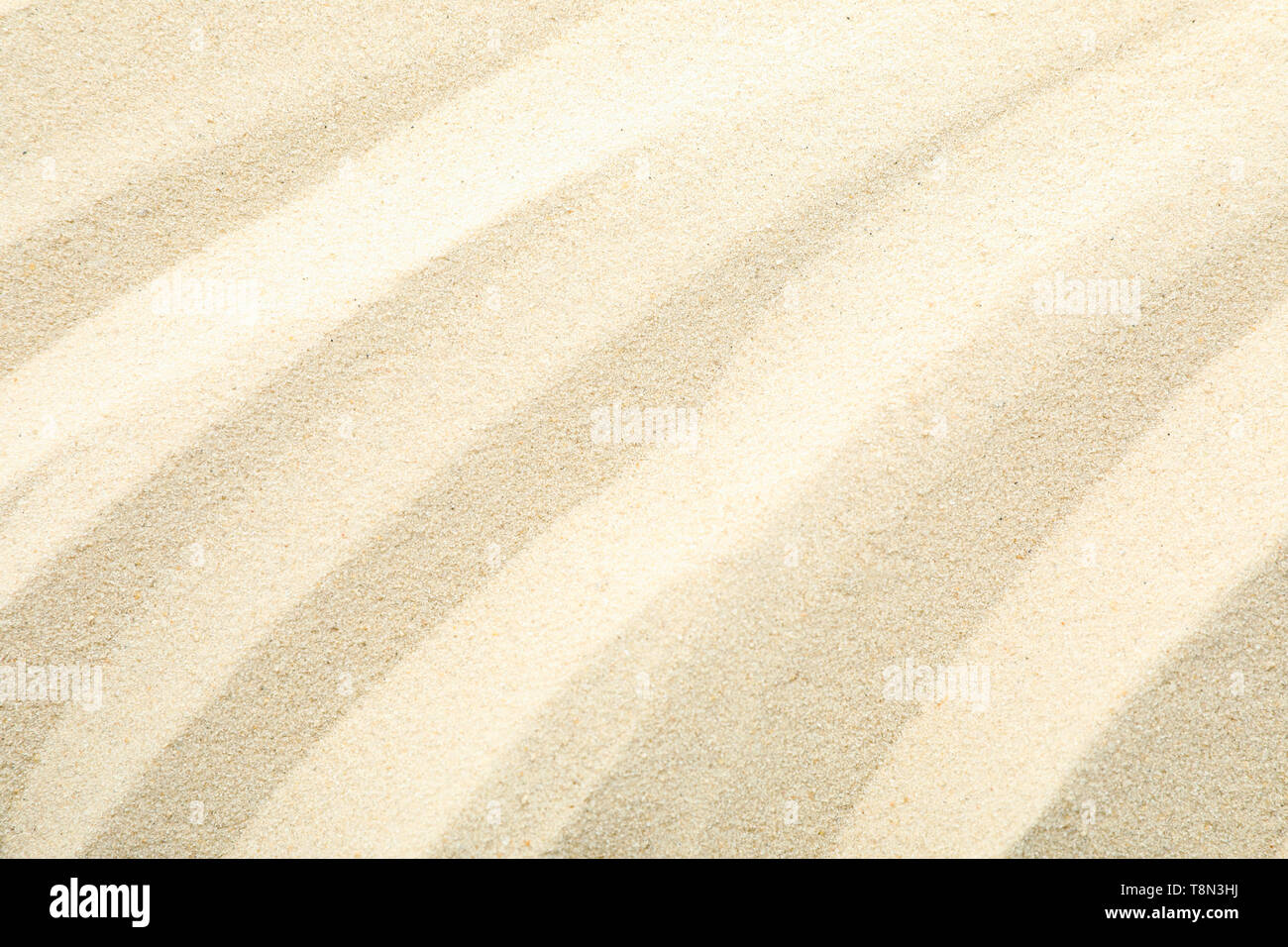 Clear sea sand as background, space for text and closeup. Summer ...