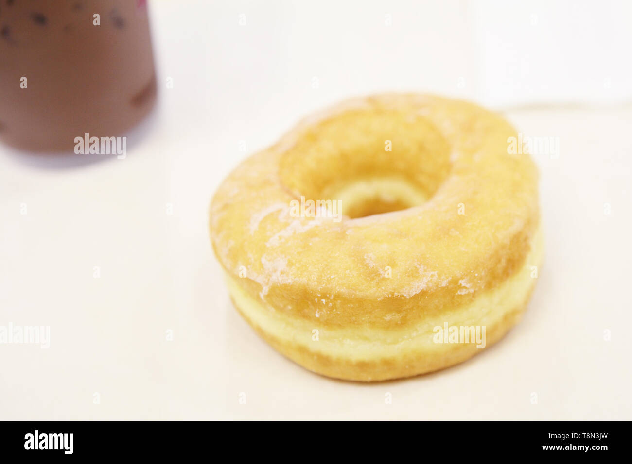Donut with ice chocolate Stock Photo - Alamy
