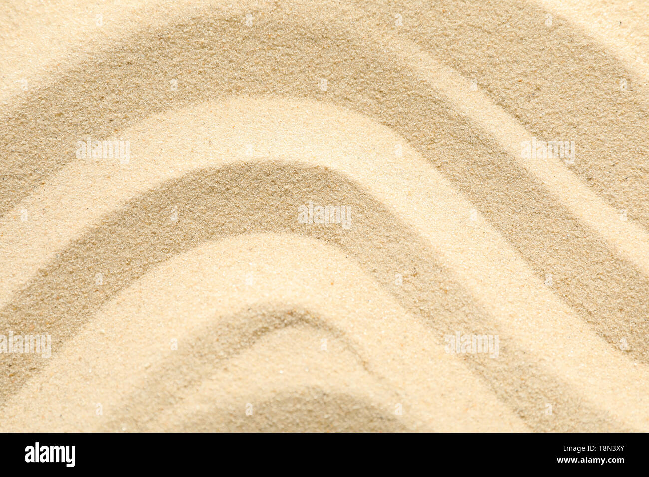 Seamless sand on a whole background, space for text and closeup. Summer ...