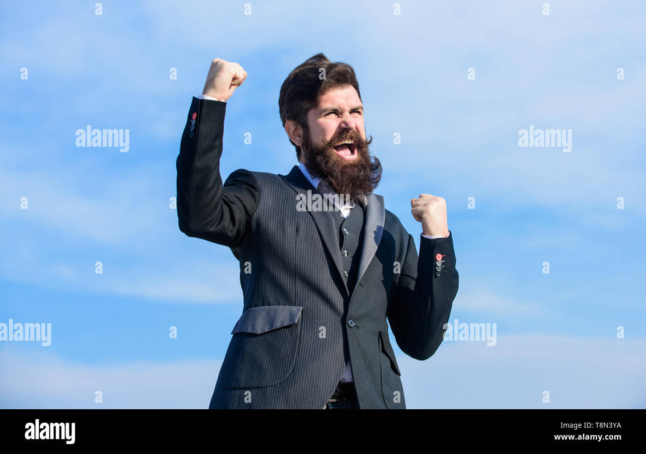 Celebrate success. Hopeful and confident about future. Man bearded ...