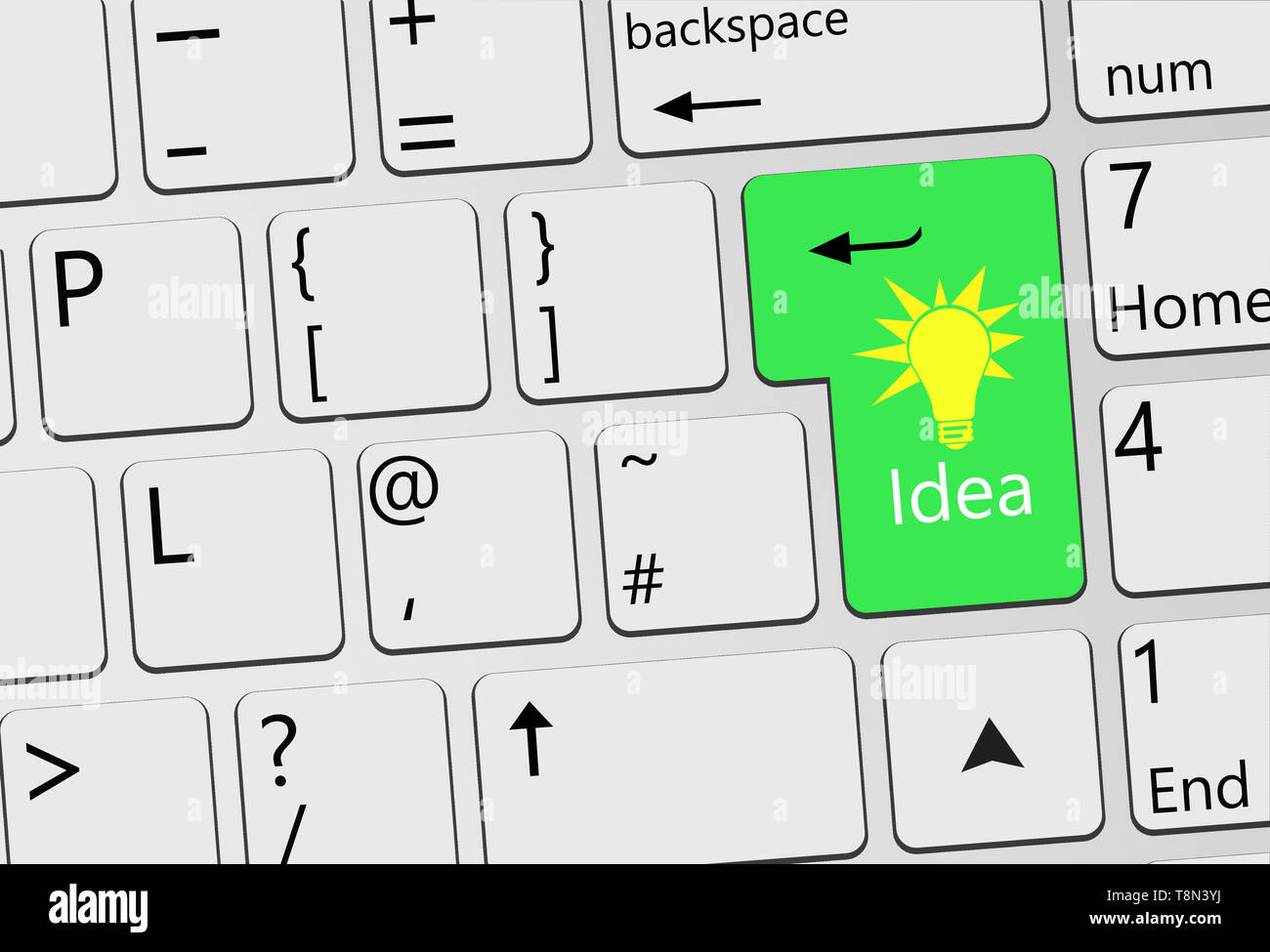 Yellow light bulb on computer keyboard Stock Photo - Alamy