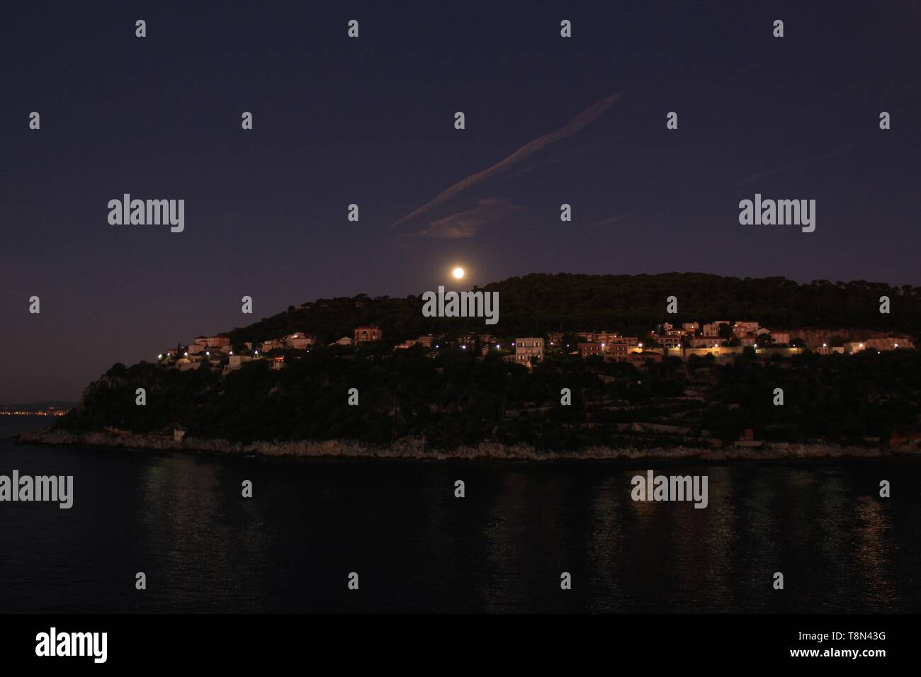 Moon Setting Into The Sea High Resolution Stock Photography and Images ...